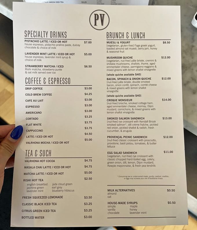 The menu reads like a love letter to refined taste—notice the pistachio latte calling your name from the top left.
