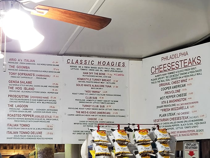 The menu board tells stories of East Coast sandwich royalty—Italian specialties, classic hoagies, and Philadelphia cheesesteaks that would make Rocky himself climb those steps for more.