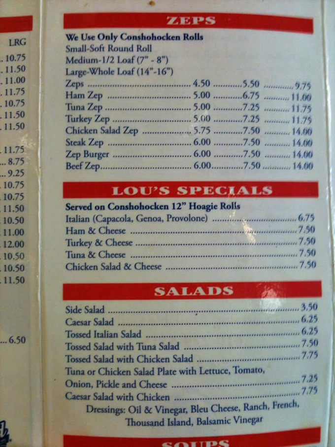 The menu board reveals Lou's commitment to Conshohocken rolls—the unsung heroes of every great Pennsylvania sandwich. Geography matters in bread geography.