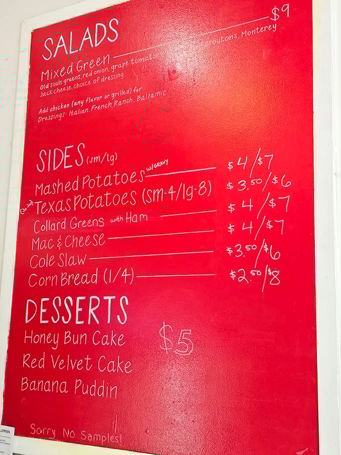 The vibrant red menu board lays out life's important decisions: collard greens with ham, mac & cheese, and the eternal question—how spicy can you handle it?