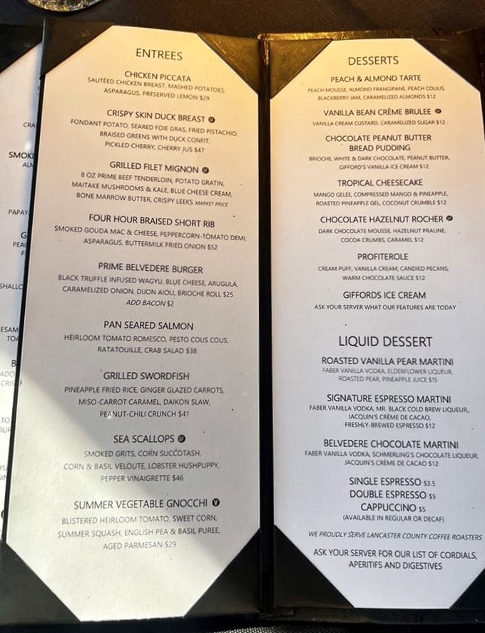 A menu that reads like a love letter to fine dining. The four-hour braised short rib beckons from the page, promising a transcendent experience.