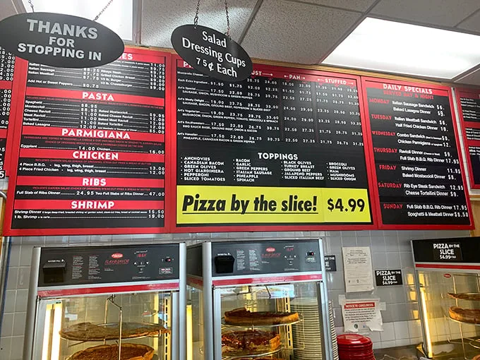 The menu board – a roadmap to happiness with its red and black lettering announcing Italian-American classics that have stood the test of time.