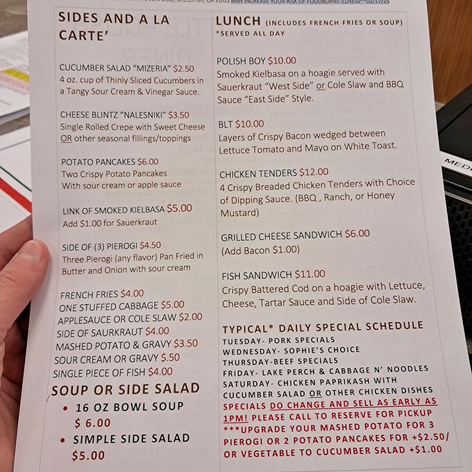 This menu reads like a love letter to Polish cuisine. Saturday's chicken paprikash special is circled in red for good reason—it's the crown jewel.