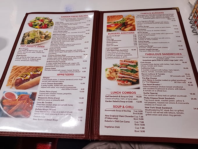 The menu at Lori's doesn't just list food—it's a roadmap to comfort. Each page promises a delicious detour from your diet plans.