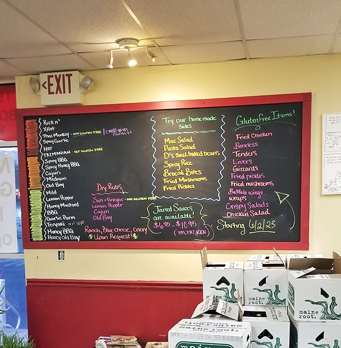 The chalkboard menu—a masterpiece of culinary possibilities—showcases an impressive array of flavors from mild to "why am I doing this to myself" hot.