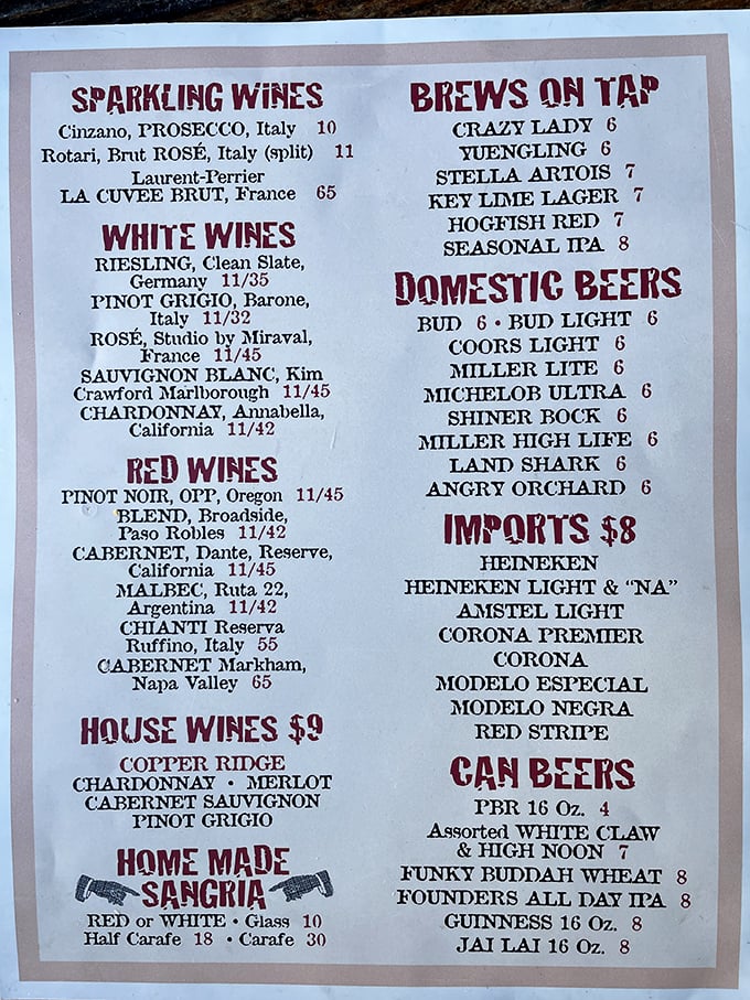 The bar isn't just where drinks are served – it's command central for the organized chaos that produces some of Florida's most memorable meals.