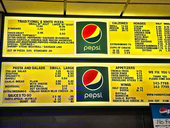 A menu board that hasn't changed in decades—because perfection doesn't need updating. The Pepsi logo might be newer than some of the recipes.