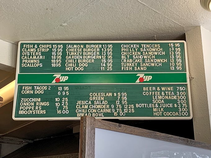The menu board—a green beacon of seafood possibilities—promises treasures from the deep without fancy descriptions or pretentious chef terminology.