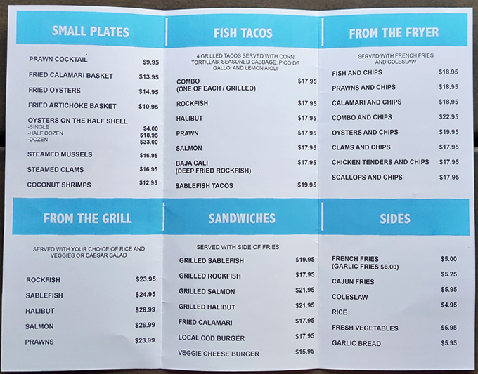 The menu reads like a love letter to the ocean—each section a different chapter in your seafood romance story.