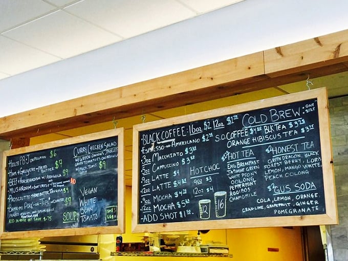 The chalkboard menu – where decisions become deliciously difficult and coffee dreams come true.