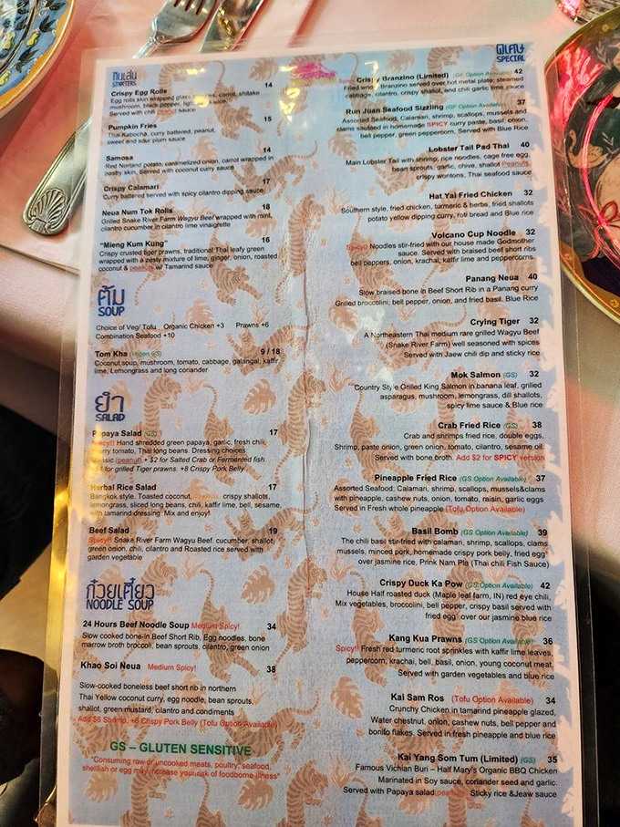 The menu reads like a love letter to Thailand's regional cuisines—each dish a chapter in a delicious story waiting to unfold on your table.