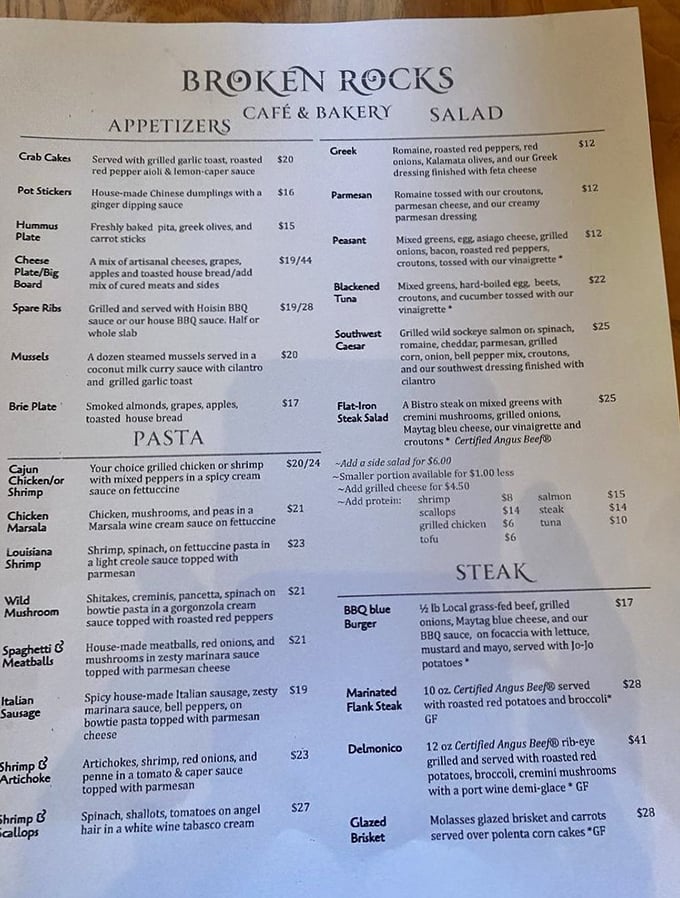A menu that reads like a love letter to comfort food. Each description promises a dish that doesn't just fill your stomach but hugs your soul.