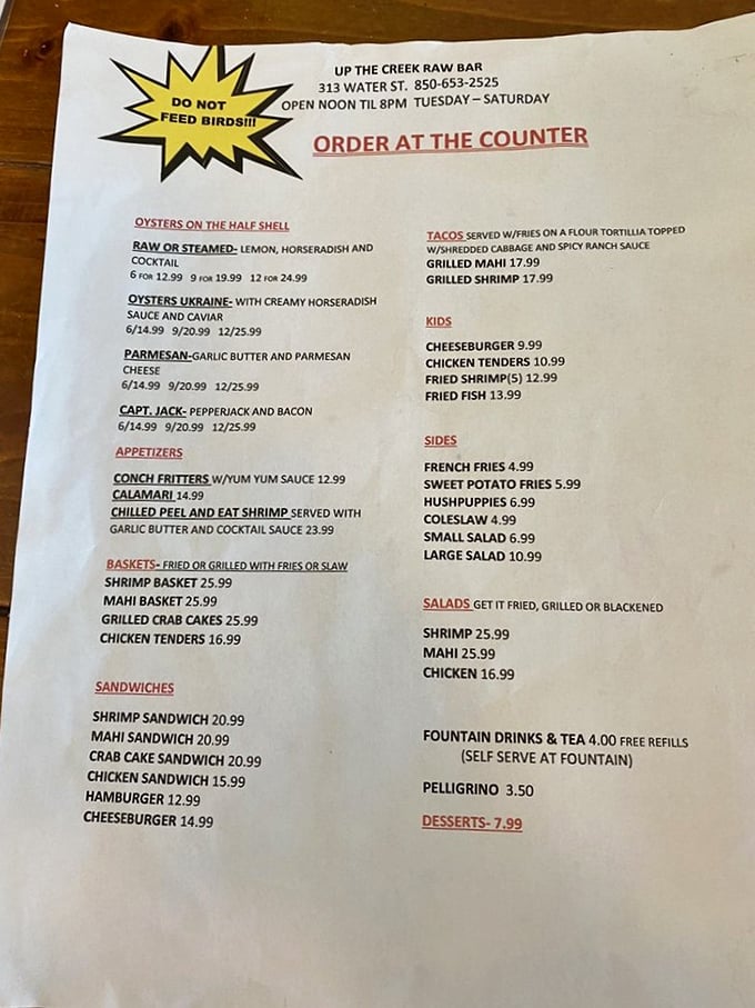 The menu reads like a love letter to the Gulf—oysters prepared six ways and seafood baskets that make choosing feel like Sophie's Choice for hungry people.