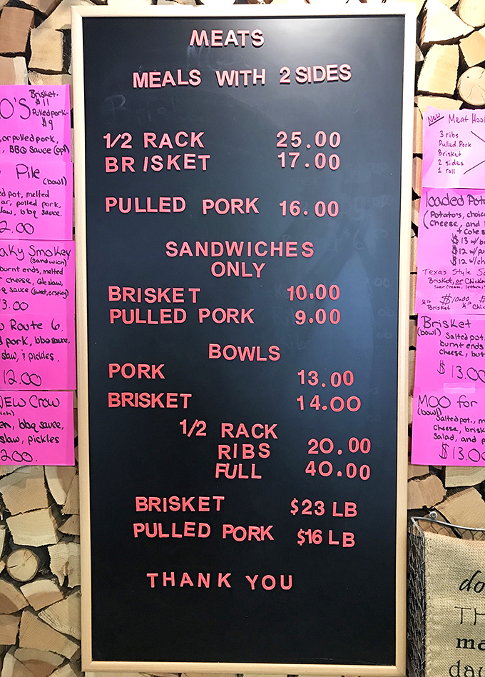 The menu board speaks the universal language of barbecue – no fancy descriptions needed when the meat does all the talking.