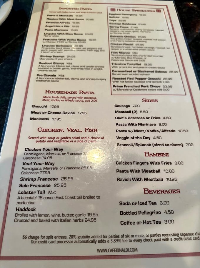 A menu that reads like a love letter to Italian cuisine – each dish promising a journey through generations of culinary tradition.