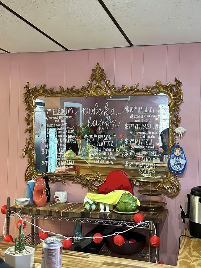 That ornate gold-framed mirror menu isn't just showing prices—it's offering a portal to Polish culinary paradise.