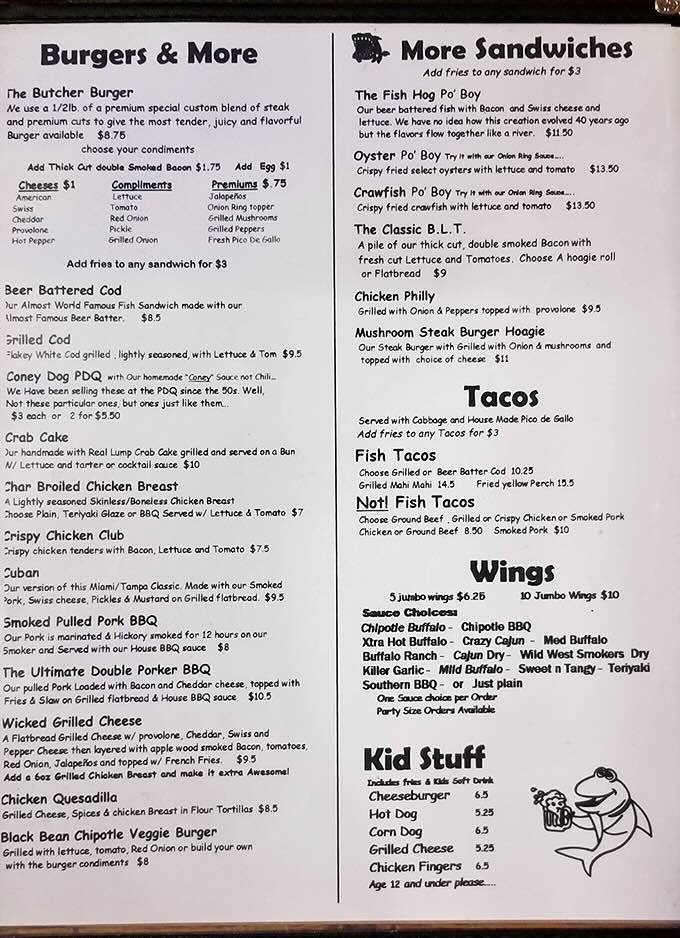 A menu that reads like a love letter to comfort food. The Fish Hog Po' Boy's mysterious 40-year evolution is the culinary equivalent of finding buried treasure.