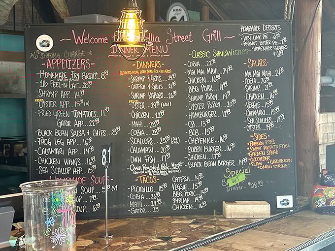 The chalkboard menu—a delicious roadmap to happiness where "Kiss My Grits" isn't just a saying from "Alice" but solid culinary advice.