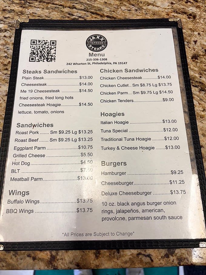 A menu that doesn't need a translator—just straightforward Philadelphia perfection with cheesesteaks, hoagies, and burgers taking center stage.