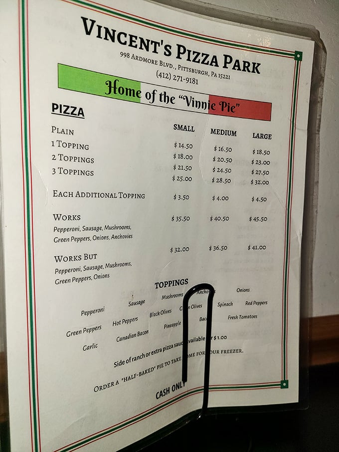 The menu board tells you everything you need to know: "Home of the Vinnie Pie." Simple choices, extraordinary results.