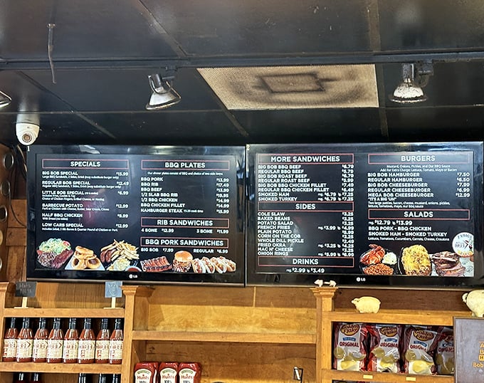 The menu board—a sacred text for BBQ disciples. Notice how "sides" take up the smallest space? Priorities, people.