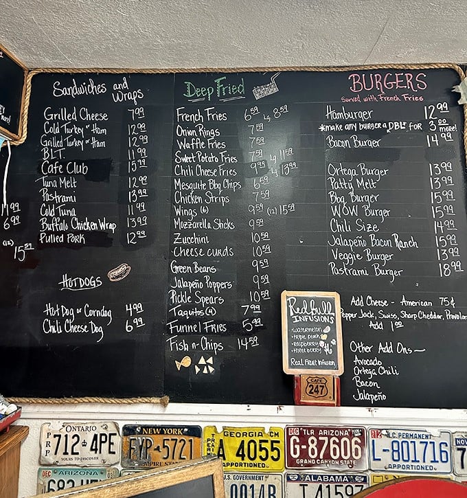 The chalkboard menu reads like a rock ‘n’ roll setlist—burgers, fries, and deep-fried encores waiting to play.