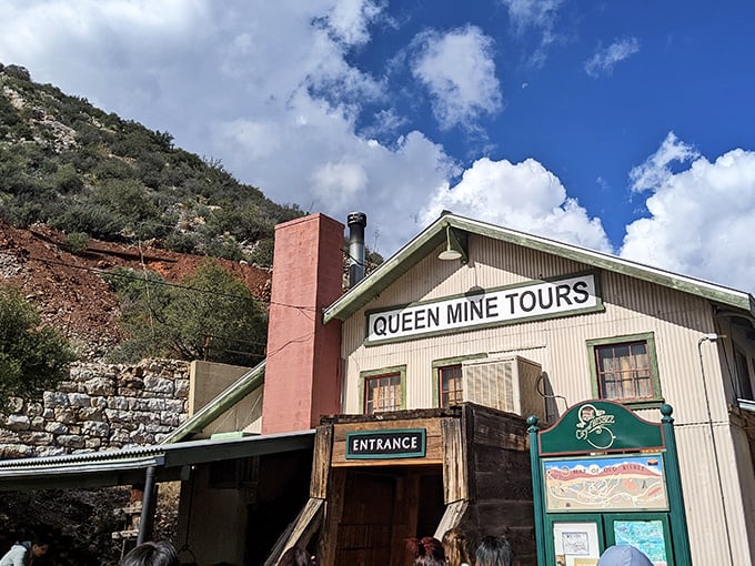 We're going underground! The Queen Mine Tour entrance promises a cool 58-degree respite from desert heat and a journey into Bisbee's copper-laden heart.