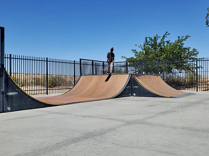 Even in the desert wilderness, skaters find their tribe at Joshua Tree's community skatepark – proof that California cool thrives in any climate.
