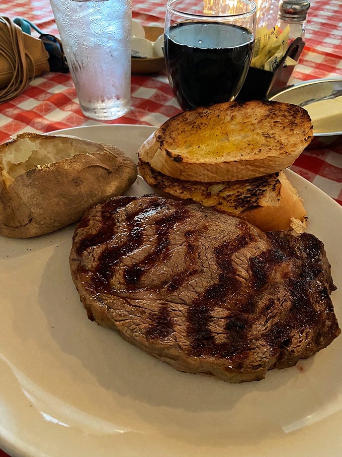 The star of the show in all its glory. This perfectly seared steak doesn't need fancy garnishes—it commands the plate with confidence that would make Frank Sinatra proud.