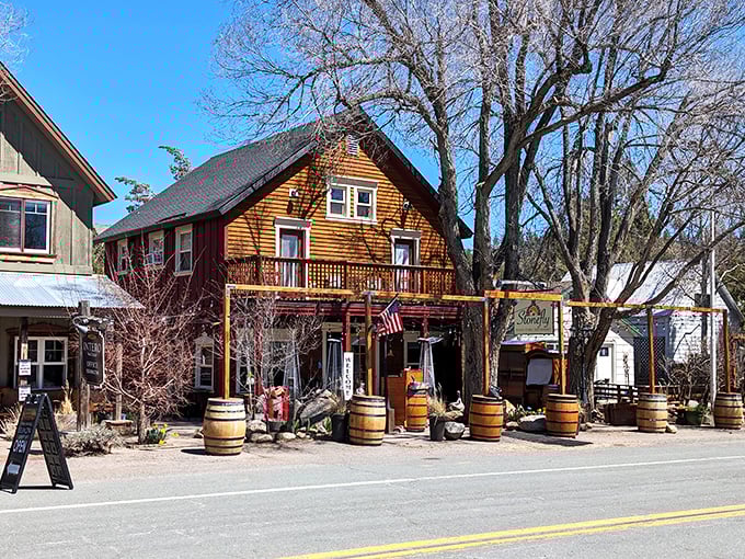 Rustic wooden barrels and frontier architecture create the perfect backdrop for an afternoon drink. This isn't manufactured quaintness—it's the real Sierra Nevada deal.