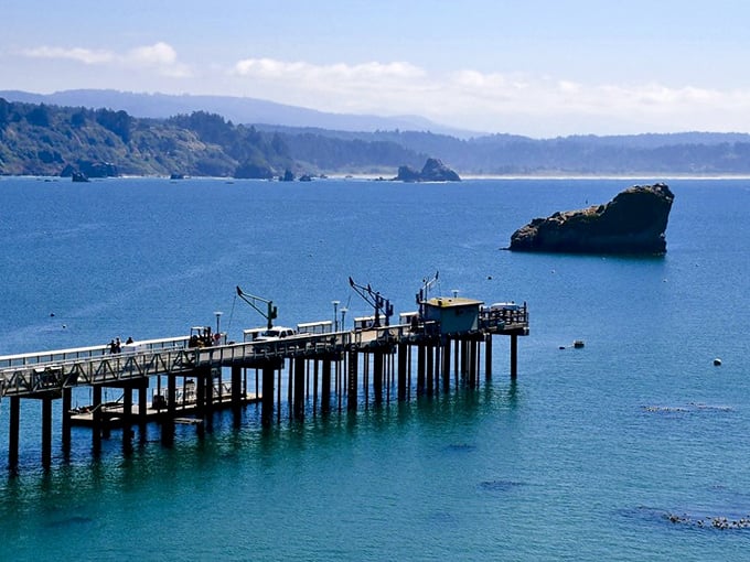 That pier isn't just functional—it's the front porch to the Pacific, where fishing boats and daydreamers share equal billing.