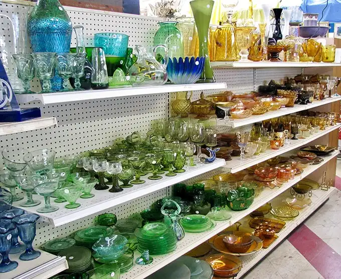 Depression glass heaven! These colorful vintage treasures are arranged by hue, creating an edible-looking rainbow your grandmother would approve of.