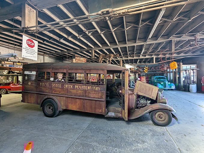 This rusted Goose Creek Penitentiary bus isn't taking prisoners anymore—just capturing the imagination of visitors with its haunting presence.