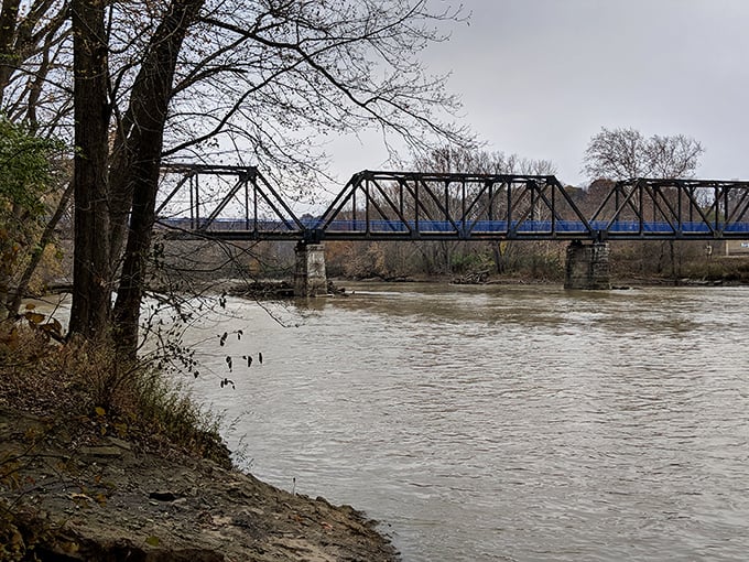 The Wabash River flows steadily beneath Peru's iron bridge, a timeless scene that's been the backdrop for generations of local fishing stories.