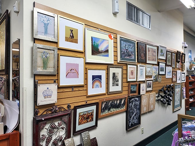 The art wall transforms discarded frames and forgotten prints into a gallery of possibility—someone's rejected landscape might be your living room's missing piece.