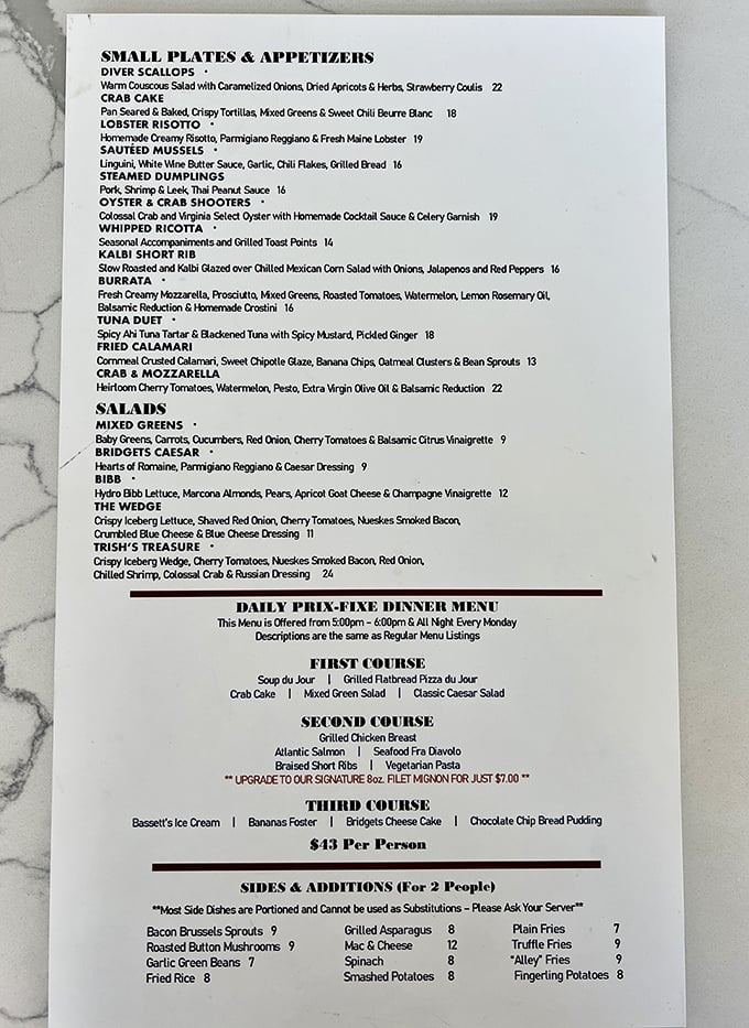 A menu that reads like a love letter to food lovers. That crab cake listing? It's basically saying "order me immediately."