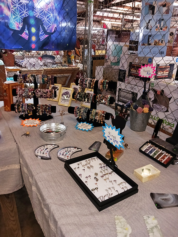 Colorful beaded bracelets and spiritual trinkets line this vendor's table, offering both adornment and perhaps a touch of cosmic protection for the superstitious shopper.