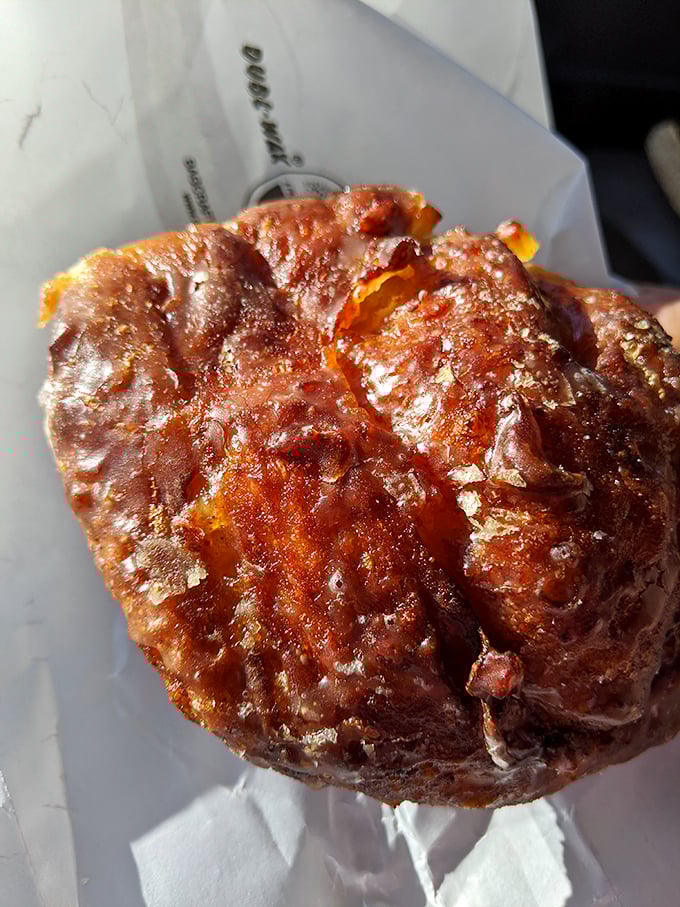 This isn't just an apple fritter—it's a masterpiece of caramelized edges and tender interior that makes you question every other breakfast you've ever had.