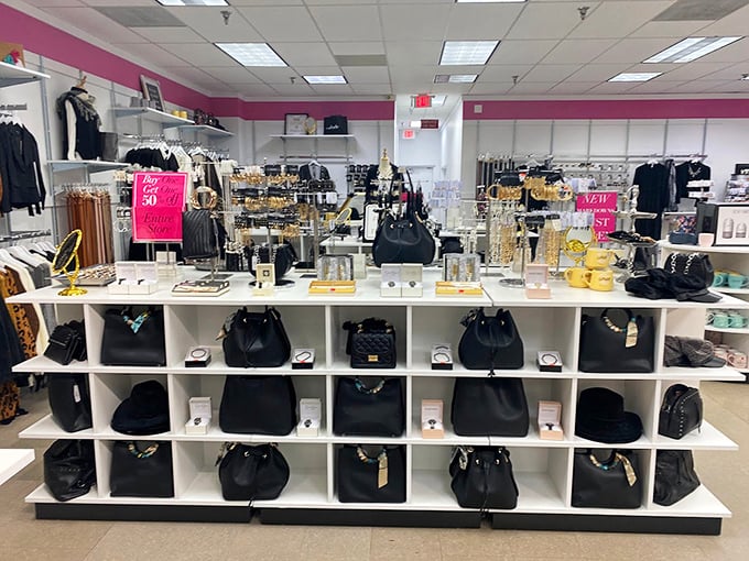 Handbag heaven isn't a myth—it's this display of perfectly arranged leather treasures. Each one whispering, "Take me home!"