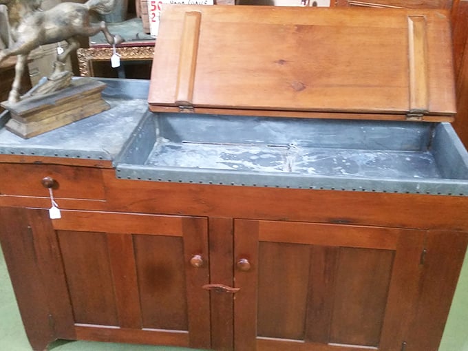 This isn't just a cabinet—it's a time capsule with drawers. Solid craftsmanship from an era when furniture was built to outlast its owners.