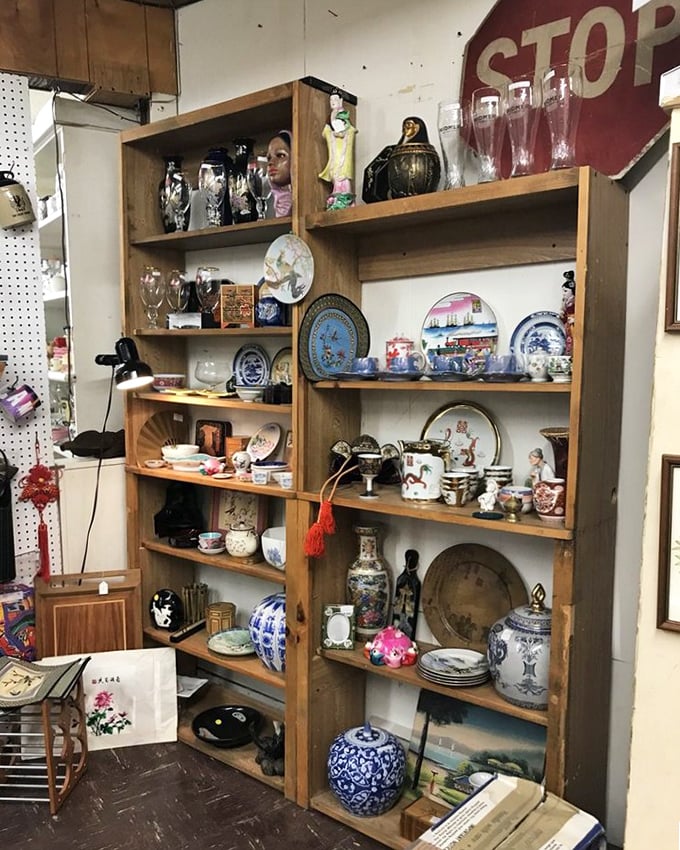 Blue and white porcelain meets religious figurines in this corner where global treasures tell stories of homes past.