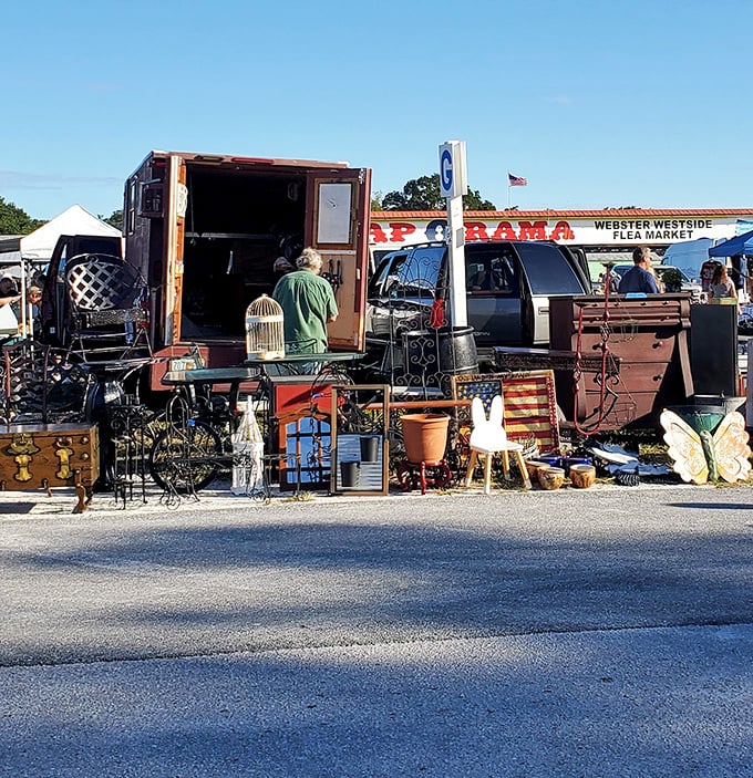 Where else can you find wrought iron garden art, vintage furniture, and a birdcage all in one spot? This vendor's eclectic collection is a decorator's dream.