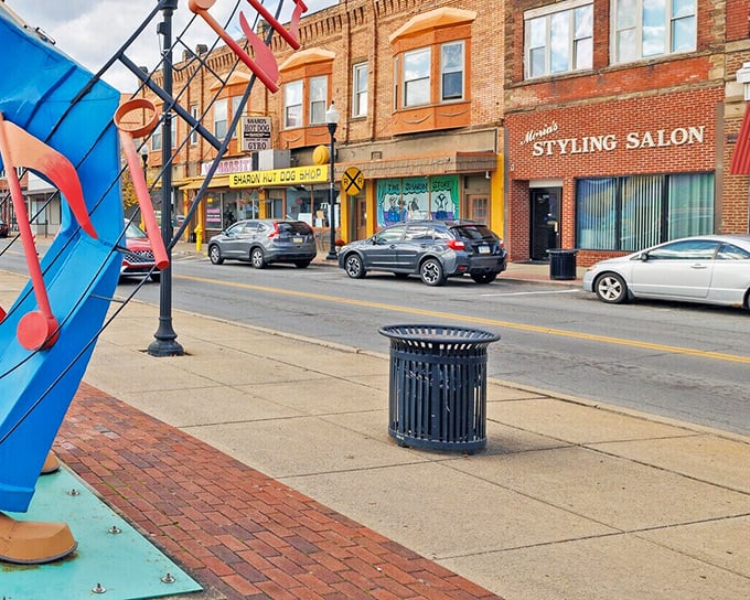 The colorful facade of this downtown building showcases international flags, a surprising nod to Sharon's global connections in this charming Pennsylvania pocket.