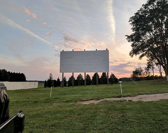 Nature provides the most spectacular pre-show entertainment—a sunset that rivals anything Hollywood could produce behind that waiting screen.