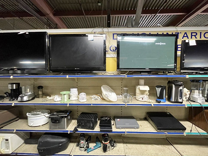 The electronics graveyard—where yesterday's cutting-edge technology finds new purpose. That rice cooker might just make the best risotto of your life!
