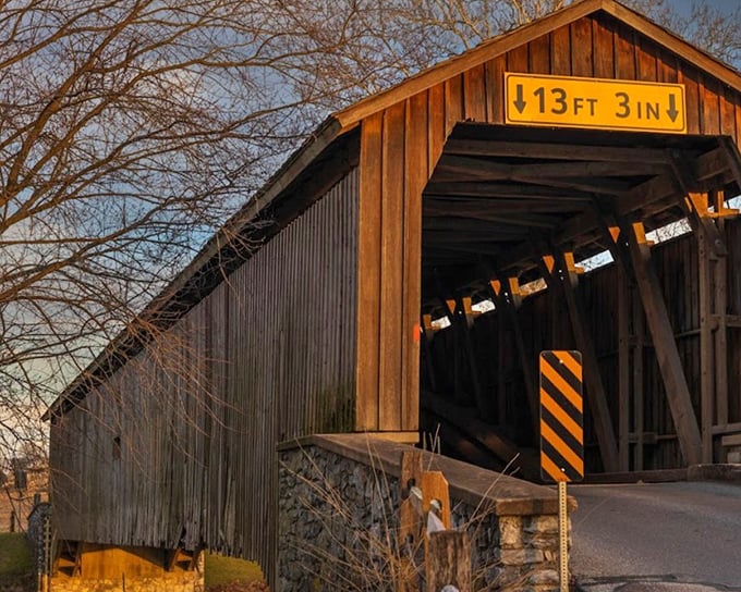 That clearance sign isn't kidding around—this bridge has humbled more than a few overconfident RV drivers.