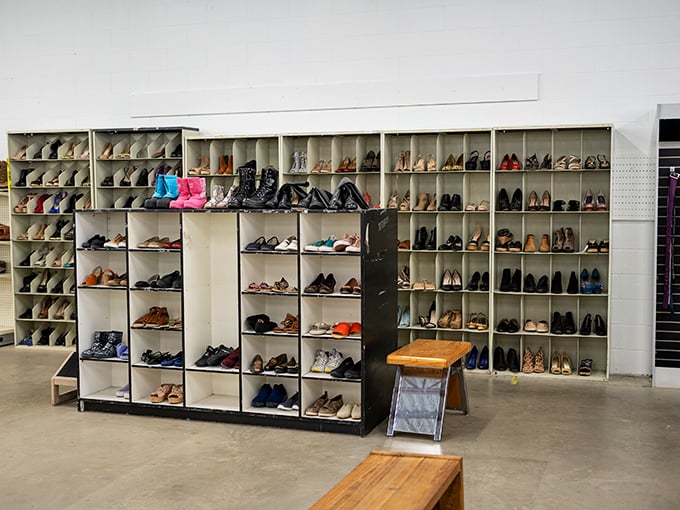 A shoe lover's paradise where every footwear fantasy lives on shelves—from practical boots to those heels someone bought for "just one special occasion."