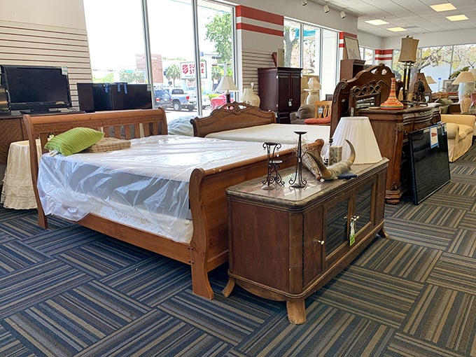 This wooden sleigh bed might have starred in a period drama before landing here – ready for its second act in your master bedroom.