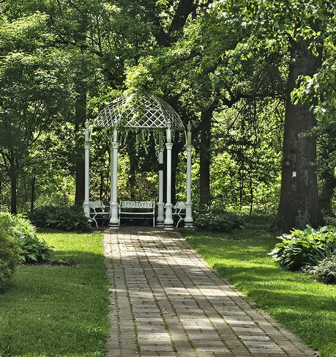This elegant gazebo isn't just Instagram-worthy—it's a time machine to when people courted in gardens instead of swiping right.