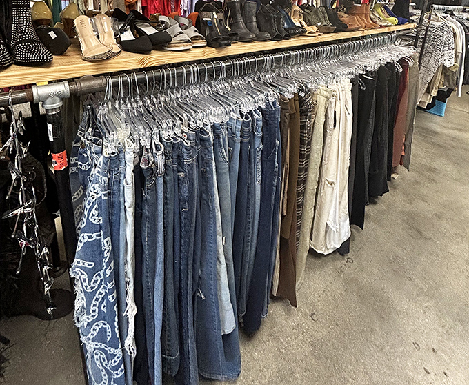 Denim democracy in action—where designer jeans and everyday brands hang side by side, waiting for their second chance at fashion glory.